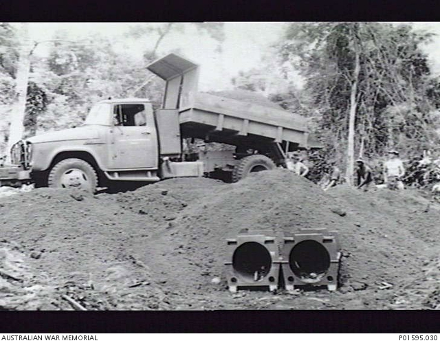 ROAD CONSTRUCTION USING NAPALM BOMB CONTAINERS AS IMPROVISED CULVERTING ...