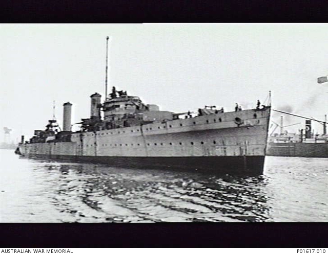 THE LIGHT CRUISER HMAS SYDNEY STILL BEING FITTED OUT IS SEEN HERE BEING ...