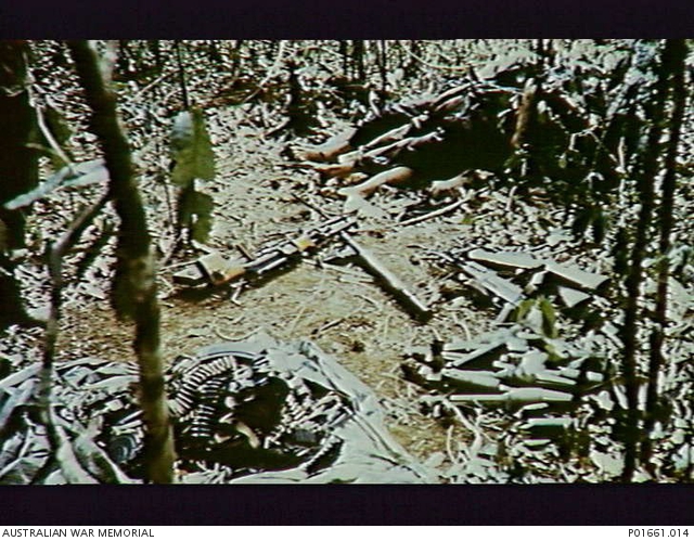 VIETNAM, 1968-02-07. WEAPONS AND AMMUNITION CAPTURED AND THE DEAD ...