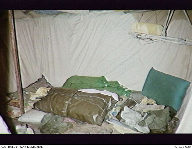 IRAQ, 1991-02-25. INTERIOR OF AN UNDERGROUND LIVING AREA FOR IRAQI ...