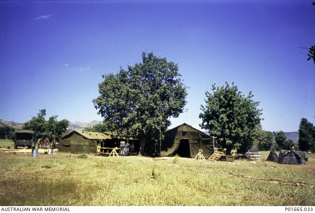 GIRIPIT, NORTHERN IRAQ. 1991-06. A BUILDING AND TENT AT THE BASE CAMP ...