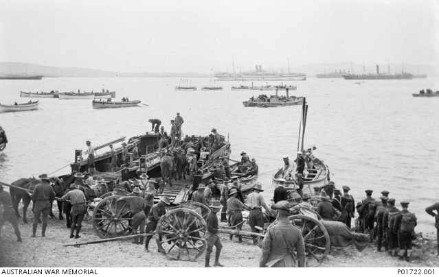 MUDROS HARBOUR, GREECE. 1915-04. HORSES, MEN AND EQUIPMENT BEING LOADED ...