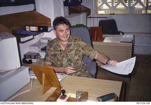 Corporal Cameron Cudahy, RAAF, at his desk in the military registry in ...