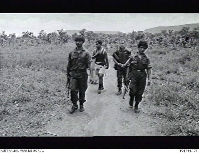 Cambodia, 1993-05-29. Three members of the Cambodian People's Armed ...