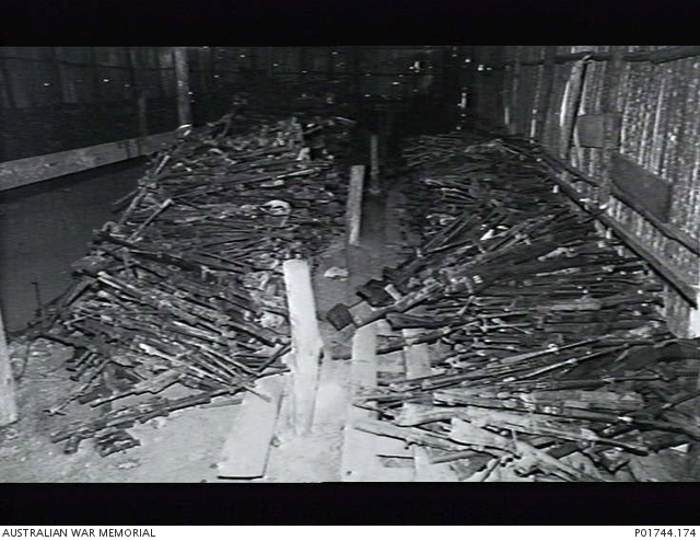 Cambodia, 1993-05-31. A huge collection of surrendered weapons piled up ...