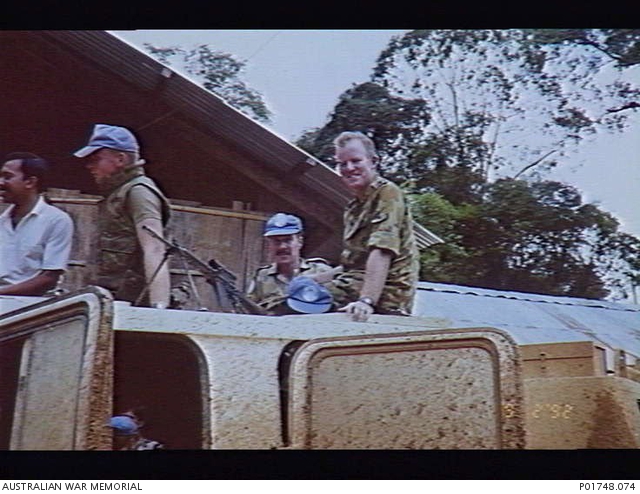 Dressed in in Disruptive Pattern Combat Uniforms (DCPU), three ...