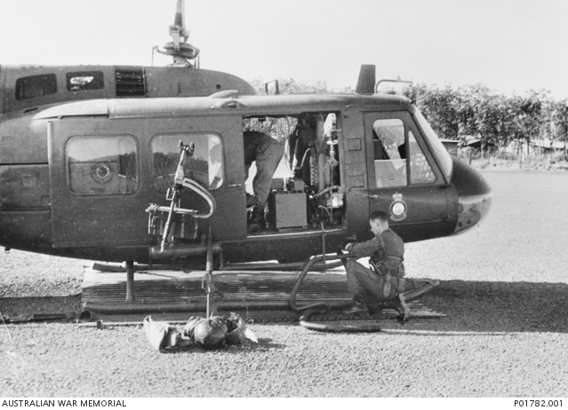An Iroquois helicopter of No. 9 Squadron RAAF being prepared for a ...