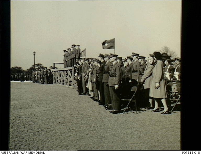 Tokyo, Japan, 1947-04. View of official guests standing and watching a ...