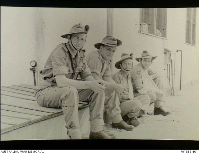 Hiro, Japan, c. 1950-09. Informal outdoors portrait of four members of ...