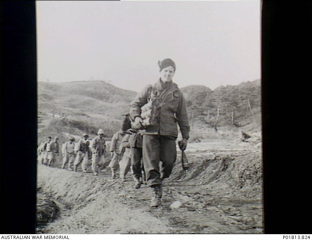 Korea, c. 1951-03. Wearing a pile cap and windproof jacket, ? Corporal ...