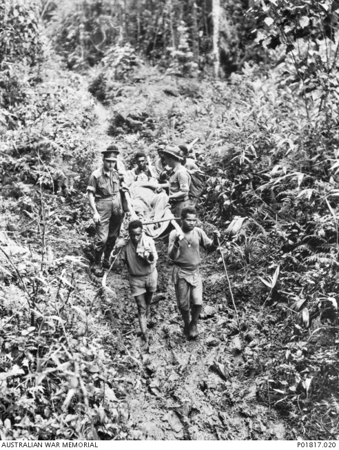 Papua-New Guinea, c. 1943. Native stretcher-bearers (often called fuzzy ...