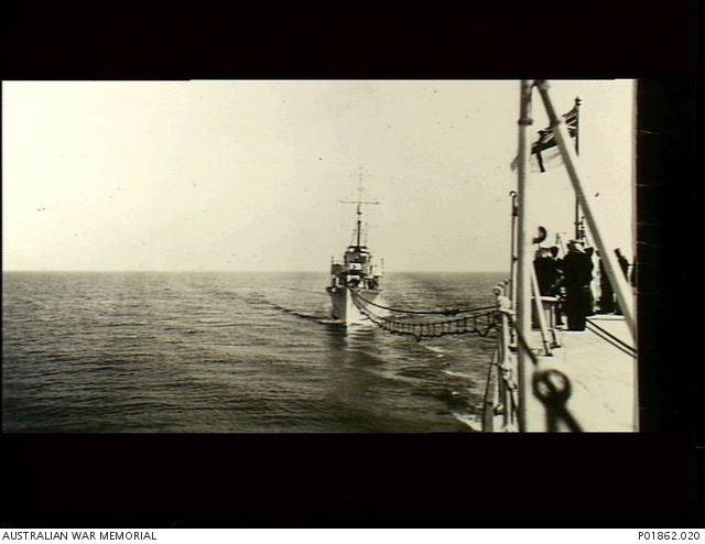 At sea off the coast of QLD, 1936-08. The RAN cruiser HMAS Canberra (in ...