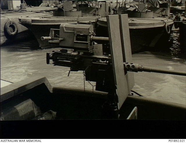 Saigon River, Vietnam. 1968. Side view of a 40mm grenade launcher with ...