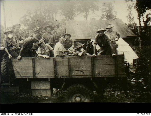 Lae, New Guinea. 1944. Men in the back of a truck at the camp at ...