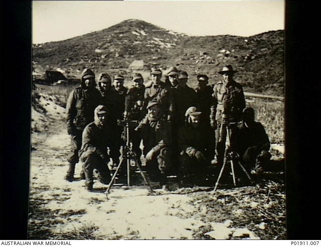 Korea. 1951-12-25. Informal group portrait of 3 Section Mortar Platoon ...