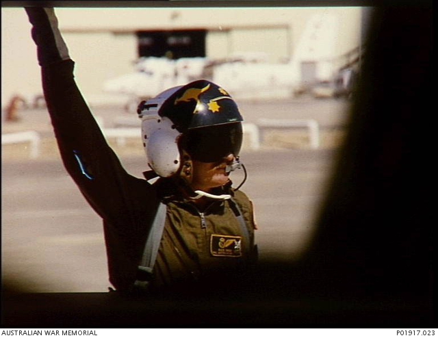 Warrant Officer Hardy holding the main blade of Iroquois helicopter A2 ...