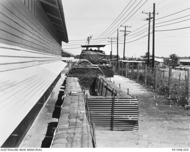 Towers, bunkers and sandbagged firing positions, along with barbed wire ...