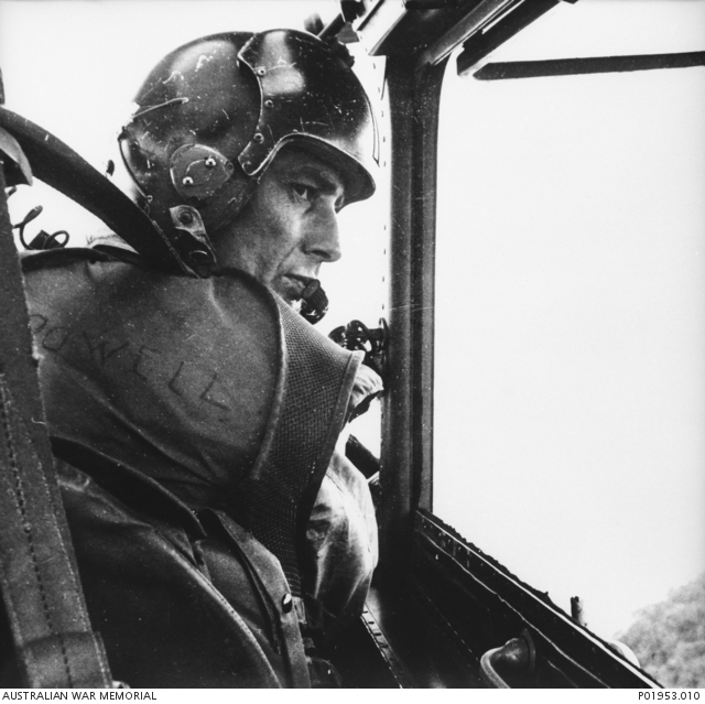 O314347 Wing Commander Anthony Watcyn Powell, piloting an Cessna O-1 ...