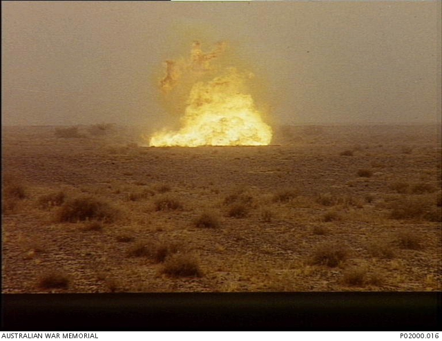 Flames rise high in the air during a propellant grain burn of 1000 ...