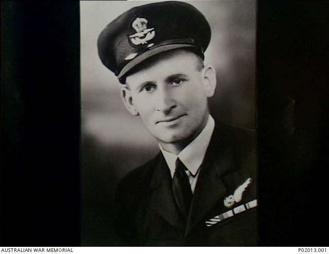 1945. Studio portrait of 425330 Flying Officer Stanley Whitesides Mason ...