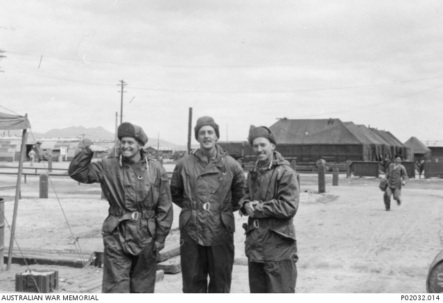 Informal group portrait of members of No. 77 (Fighter) Squadron RAAF ...