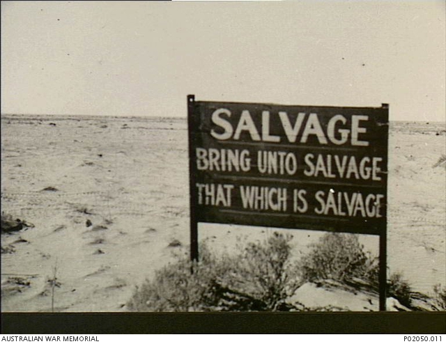 A sign encouraging soldiers to salvage materials which may be reused ...