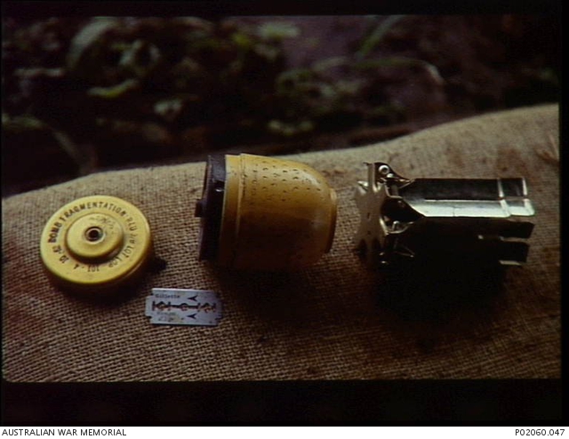 South Vietnam. 1967-07. A disassembled cluster bomblet. These were ...
