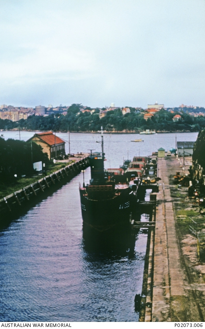 c.1969. The Army Ship Vernon Sturdee AV1355 docked at a wharf. This ...