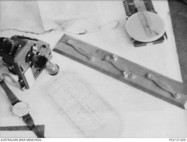 Parkes, NSW. c.1941-03. Astro navigational instruments lie on a table ...