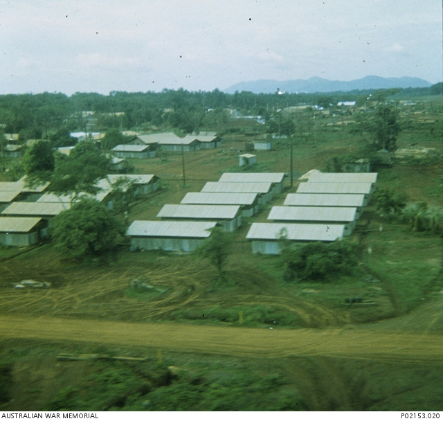 Aerial view from a helicopter of the iron roofed sheds in which 3 ...