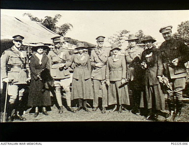 Group portrait of AIF soldiers, nurses, and locals who took part in the ...