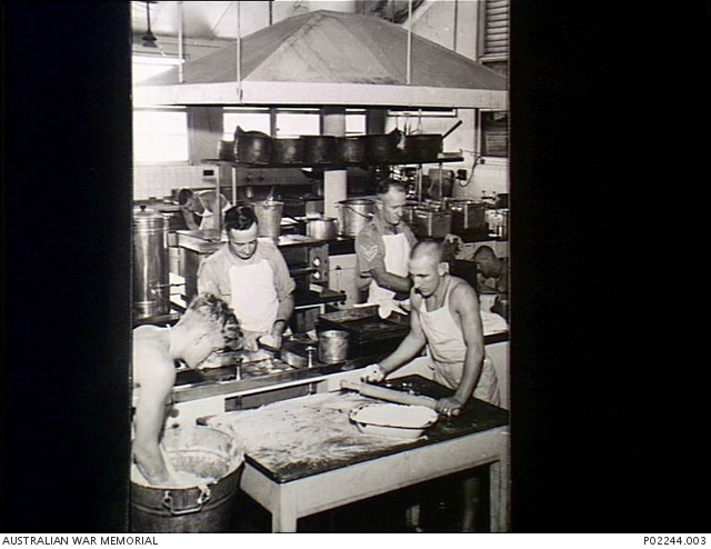 Darwin, NT. c. 1944. Cooks and other staff peeling potatoes and rolling ...