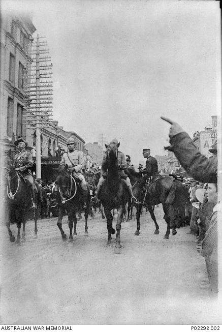 1st NSW Bushmen Contingent riding their horses along William Street ...