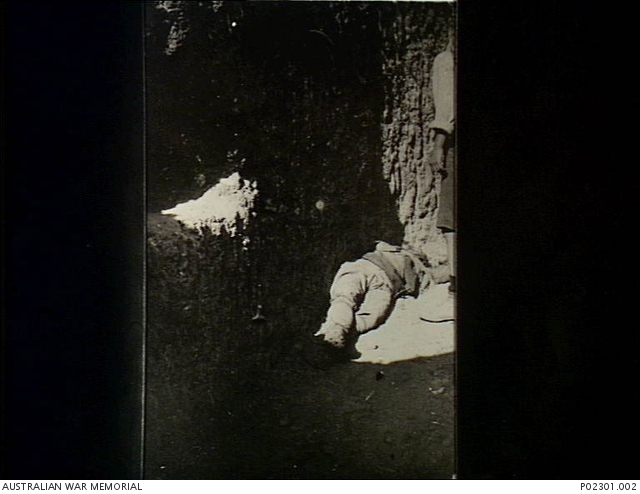 The body of a dead Turkish soldier lying in an Australian trench ...