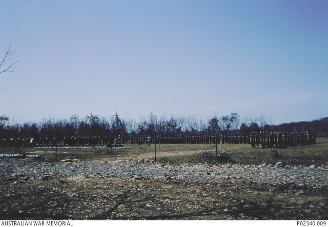 Lined up in ranks, members of the 6th Battalion, The Royal Australian ...