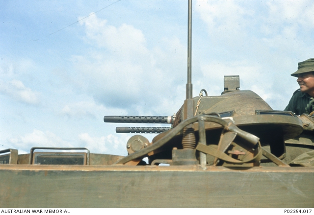 Twin .30 calibre machine guns point forward from an M74C turret fitted ...