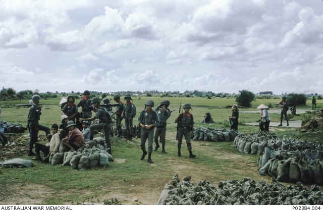 Soldiers of the Army of the Republic of Vietnam (ARVN) supervise ...