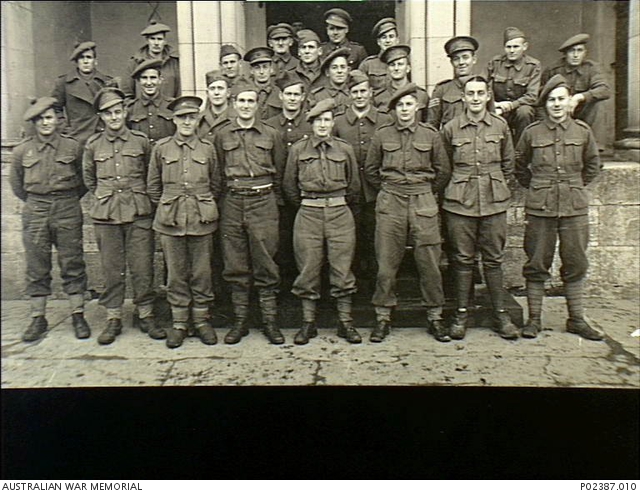 Outdoor group portrait of Australian and possibly British prisoners of ...