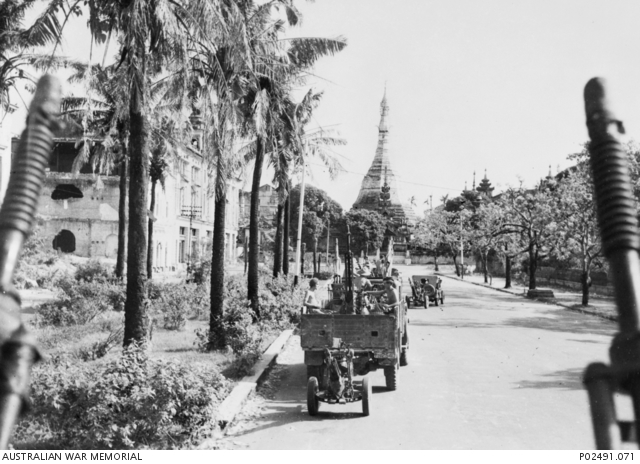 Rangoon, Burma. c. May 1945. With a golden pagoda in the distance ...