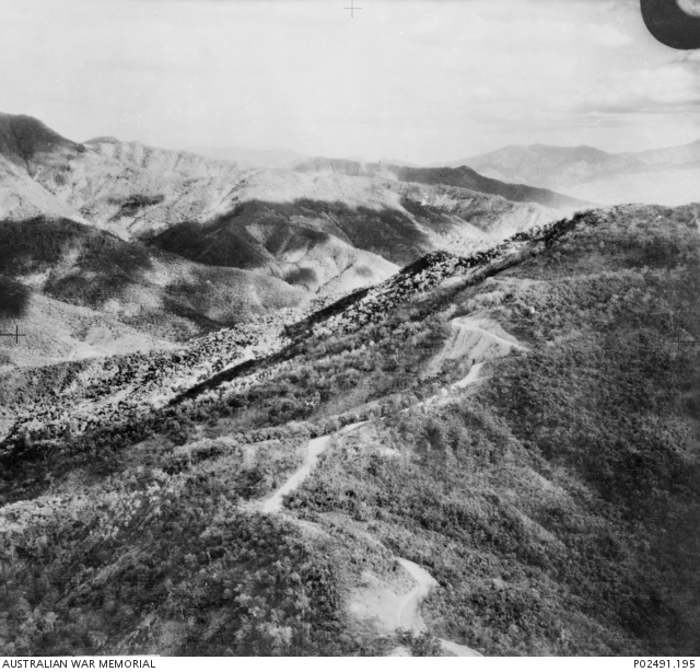 Burma. 18 March 1944. A part of the road, taken from the air, which ...