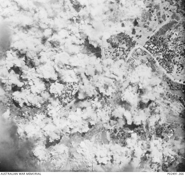 Rangoon, Burma. 11 February 1945. Japanese supply dumps covered with ...