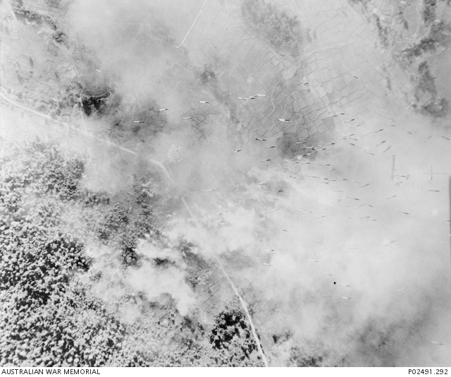 Taungup, Burma. c. February 1945. Japanese supply dumps burning from ...
