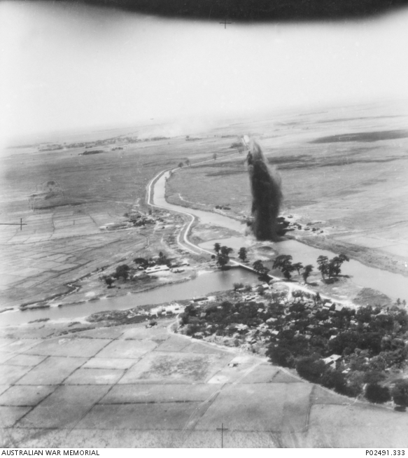 Burma. 8 April 1945. Bombs bursting in the Pegu-Sittang canal, during ...