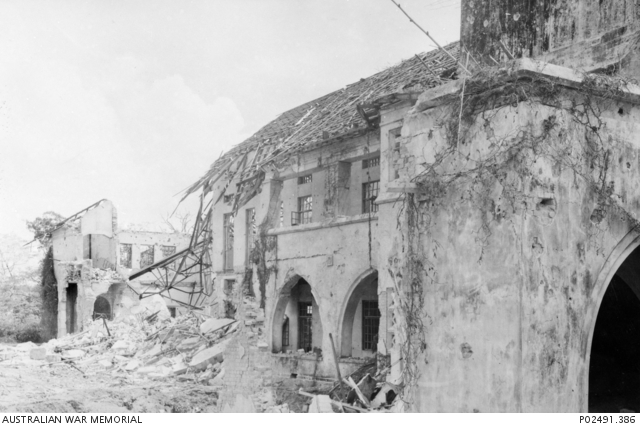Rangoon, Burma. c. 1945. Exterior view of damaged buildings at the ...