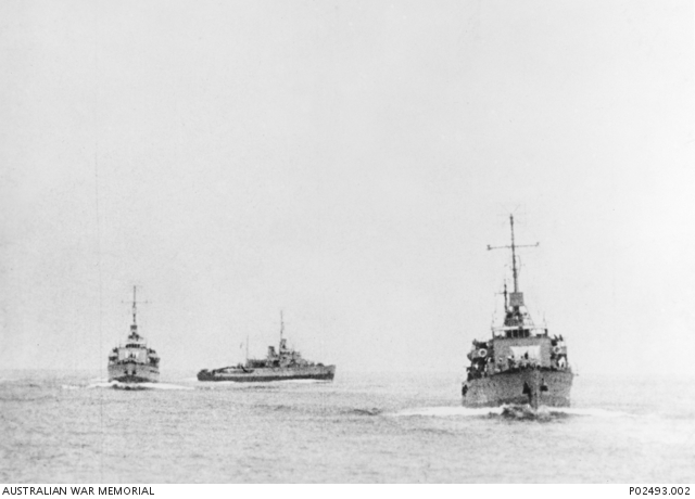 Three ships, HMAS Glenelg, HMAS Cootamundra and HMAS Junee, manoeuvre ...