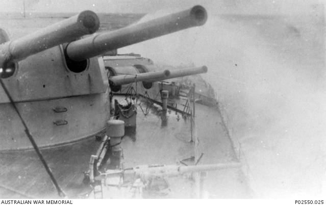 The Kent class cruiser HMAS Canberra makes heavy weather of it during a ...