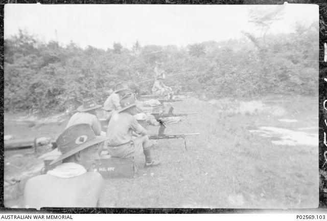 Australian soldiers at Bren gun practice. This negative features an ...