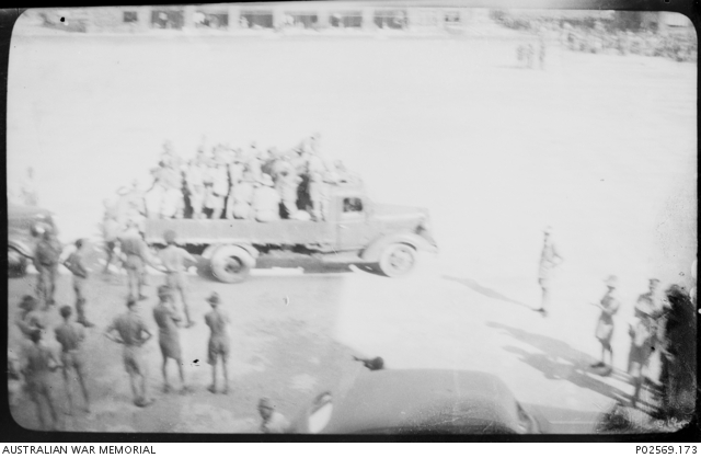 A truck of Australian soldiers assembled as the Prisoner of War (POW ...