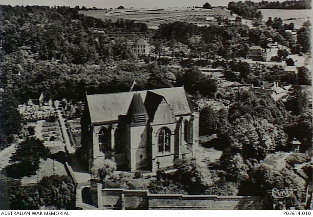 Poix, France. c. 1980. Aerial view of the Church of St Denis where ...
