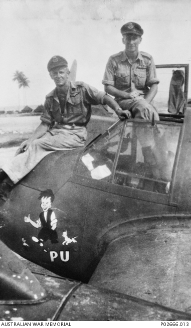 Morotai. 1945. 435153 Flying Officer Alan Miller RAAF, navigator (left) and Flying Officer Vic ...